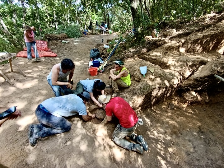 Archaeological team discovers ancient Etruscan ritual pit and votive ...
